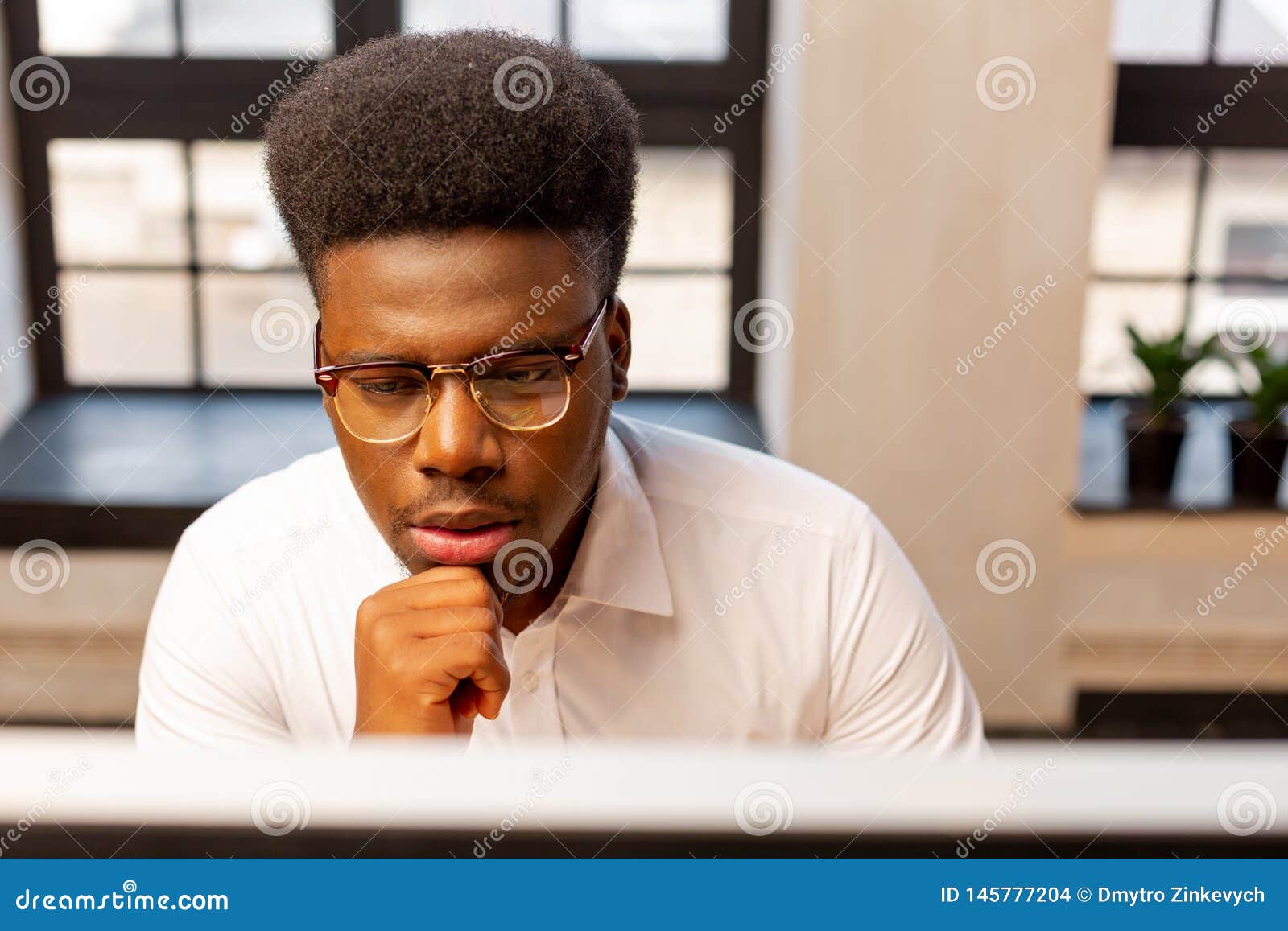 Face of a Thoughtful Serious Young Man Stock Photo - Image of ...