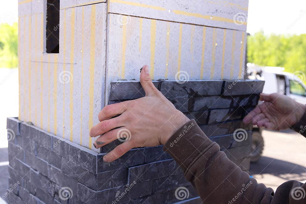 Face Tiles are Installed on Building Columns by a Tiler Stock Image ...