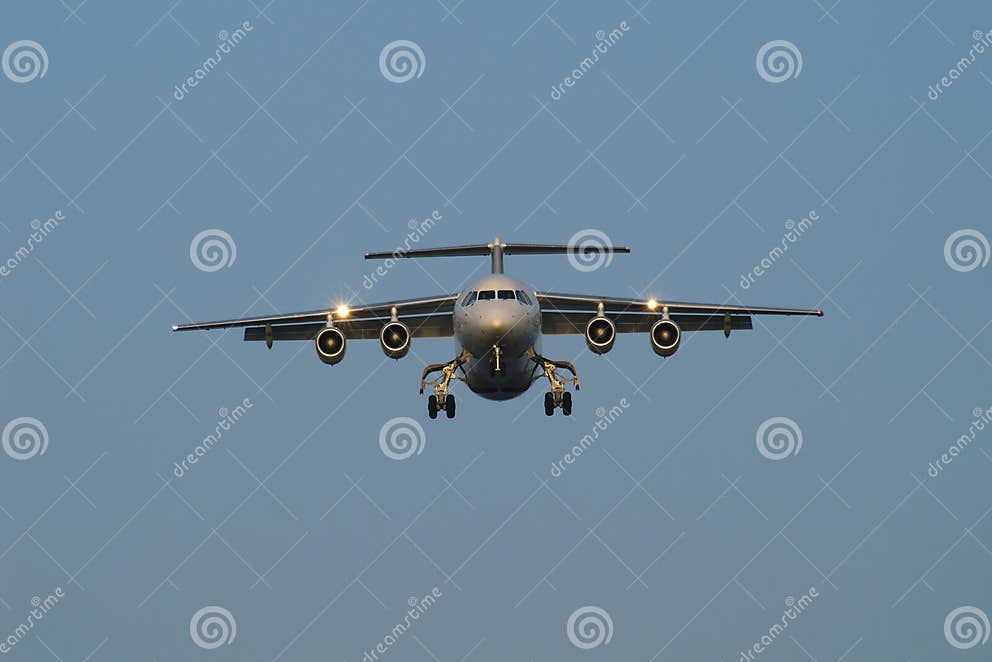 Face-to-face with Landing Plane Stock Photo - Image of land, plane ...