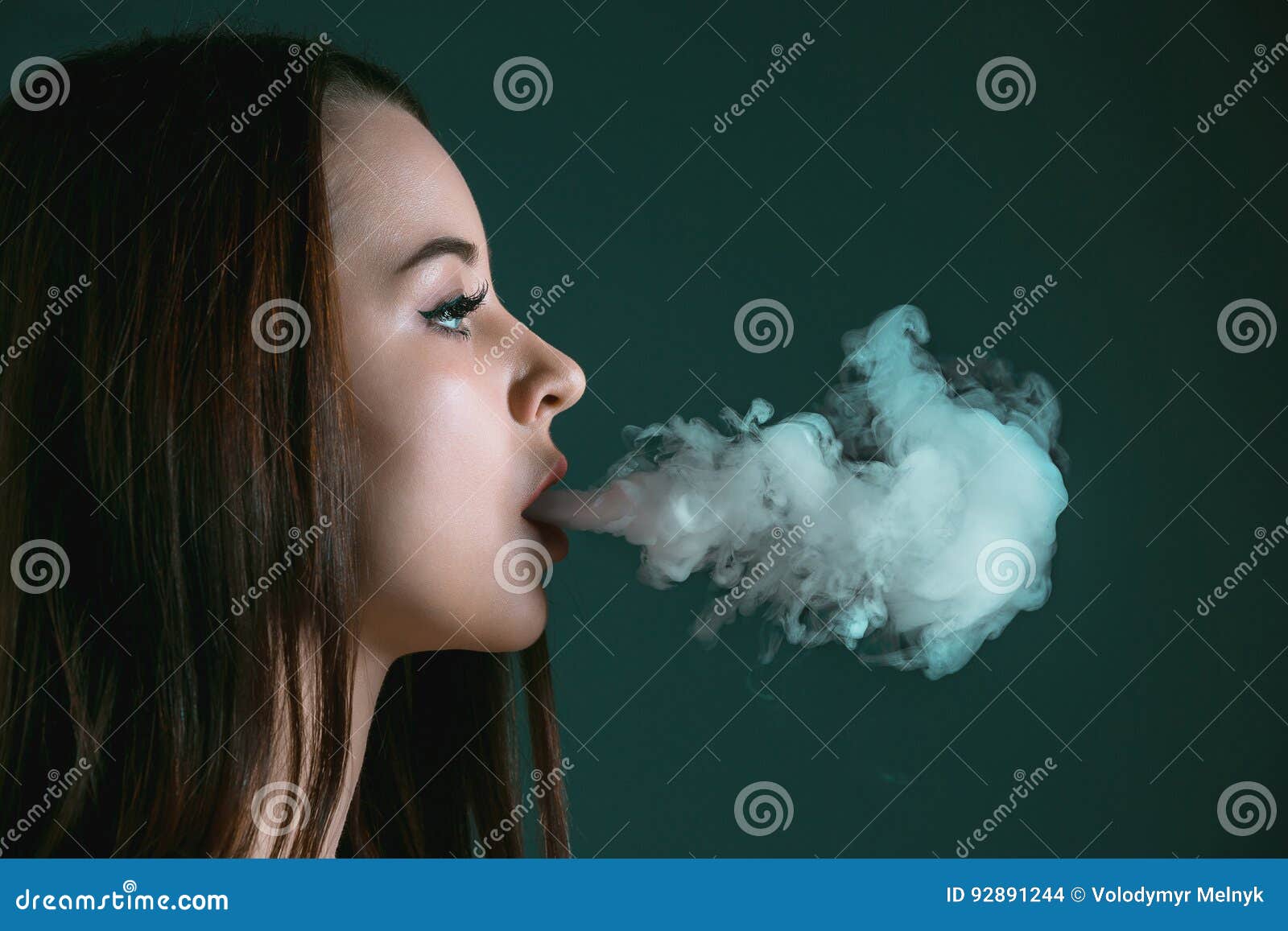 The Face of Vaping Young Woman at Black Studio Stock Photo - Image of ...