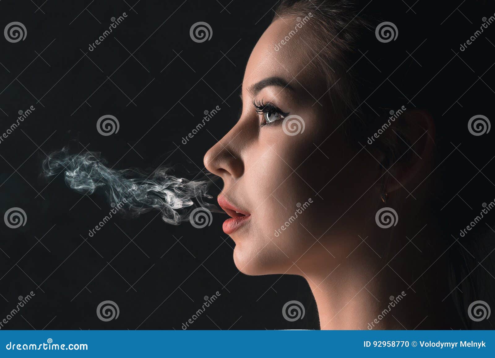 The Face of Vaping Young Woman at Black Studio Stock Photo - Image of ...