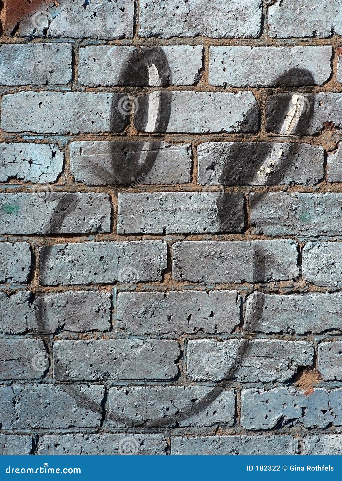 Face on a wall stock photo. Image of mouth, smile, brickwork - 182322