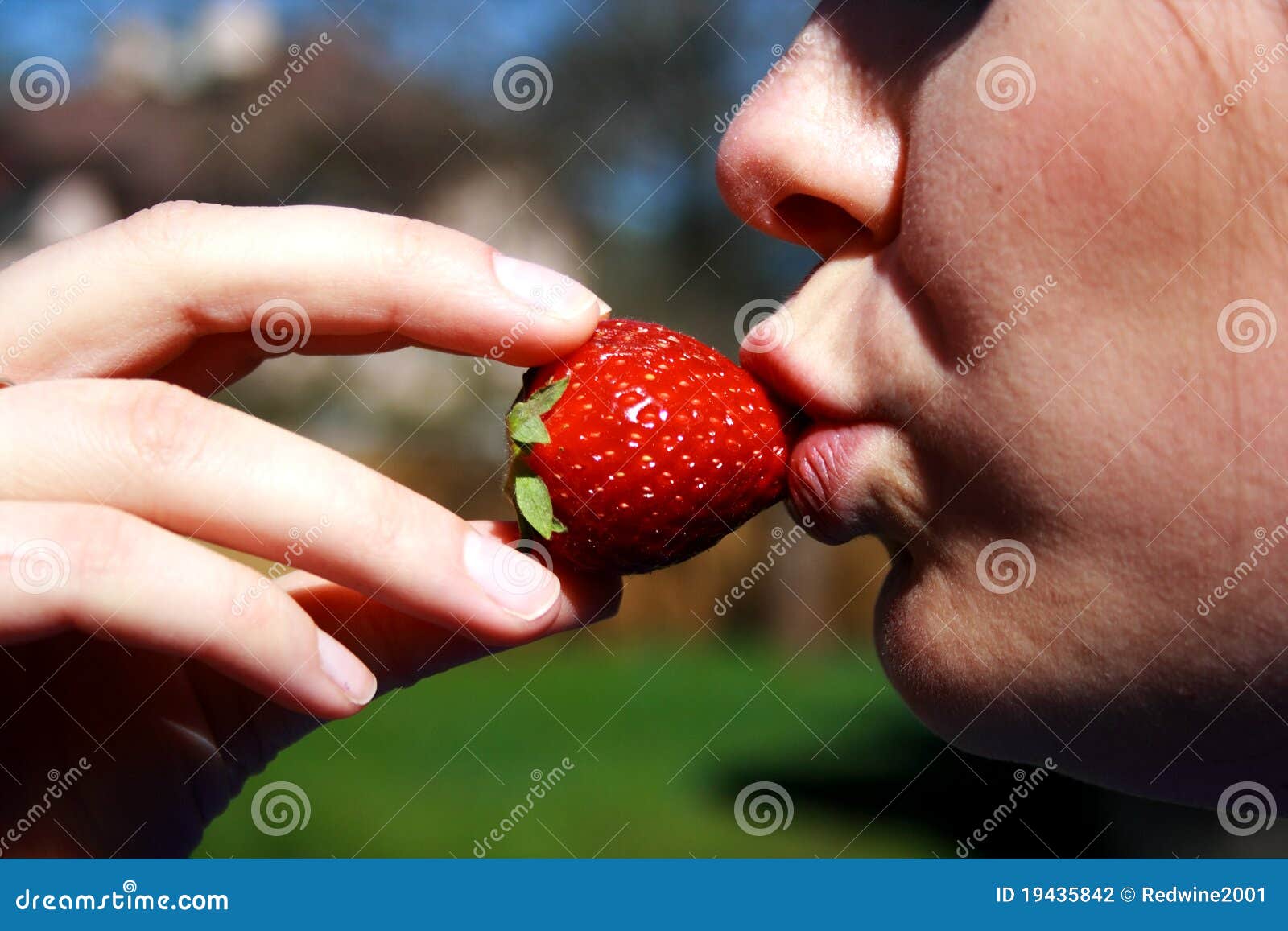 Face of the Woman Eating a Strawberry Stock Photo - Image of ...