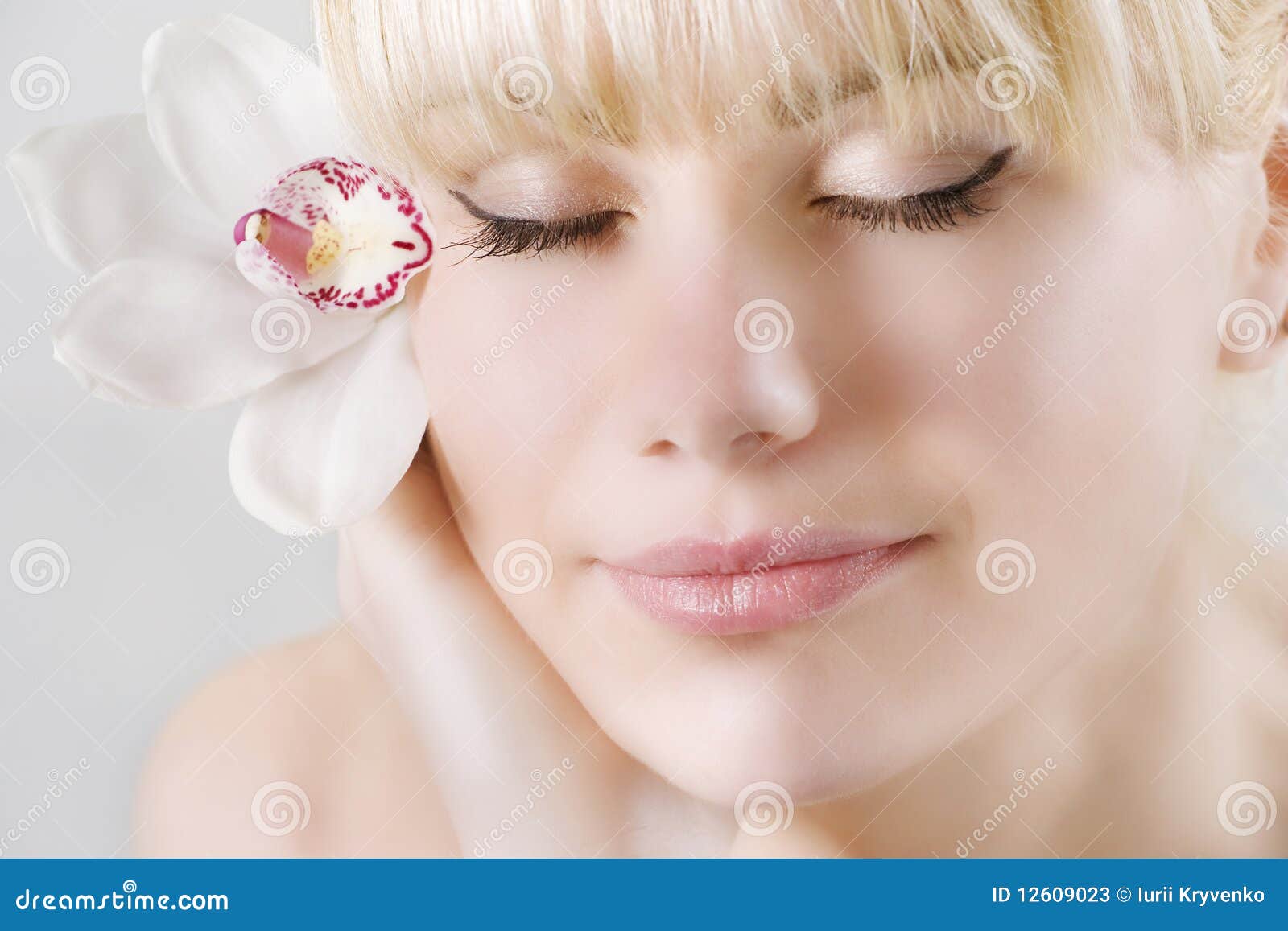 Face of woman with flower stock image. Image of head - 12609023