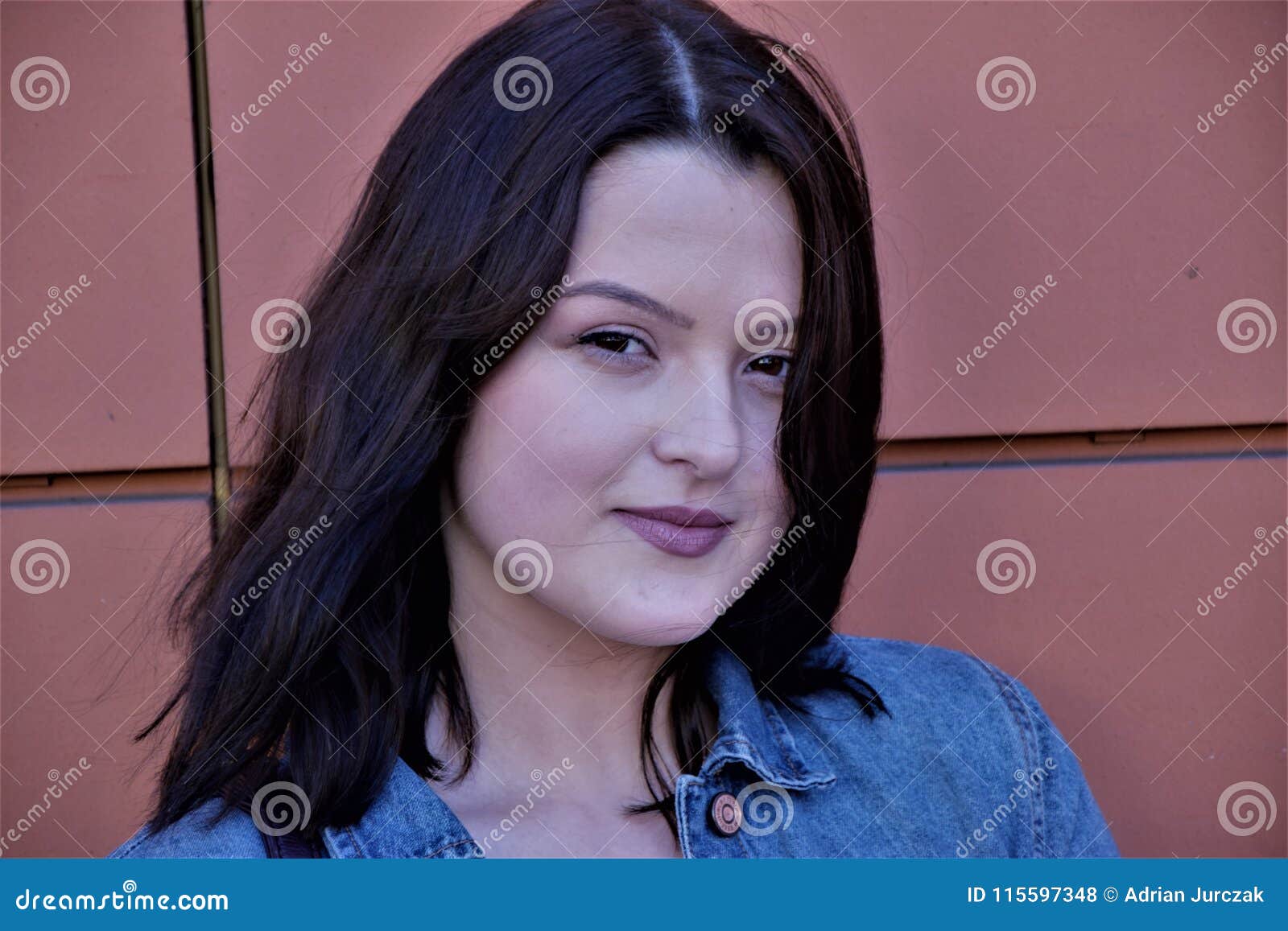 The Face of a Woman with a Slightly Raised Eyebrow Stock Photo - Image ...