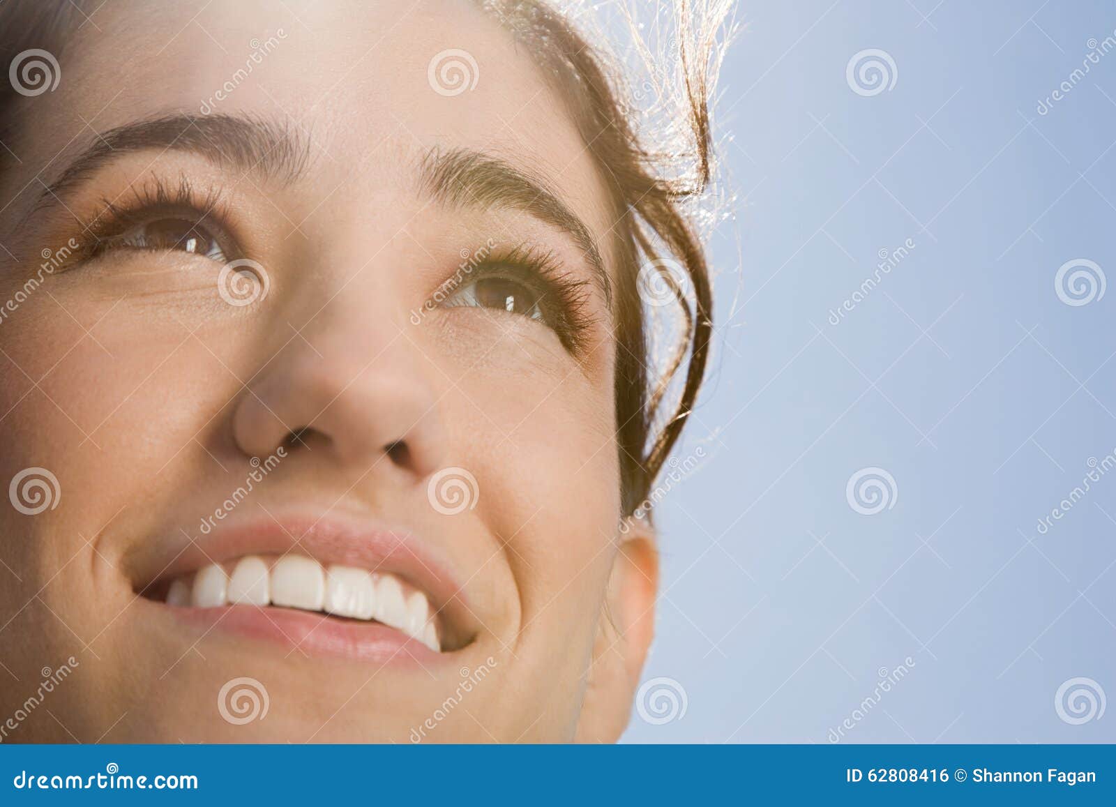 Face of a Woman in Sunlight Stock Photo - Image of life, happiness ...