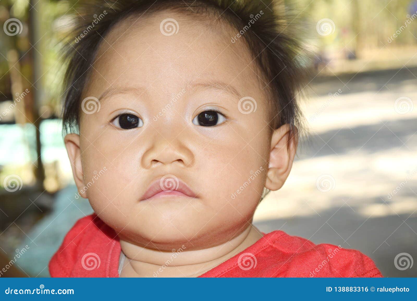 The Face of a Young Child is Staring at the Front Stock Photo - Image ...