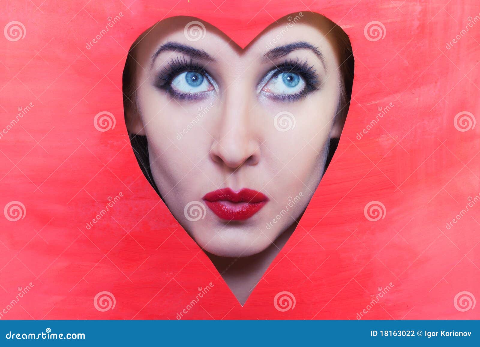 Face of Young Woman in Red Heart Stock Photo - Image of hole, look ...