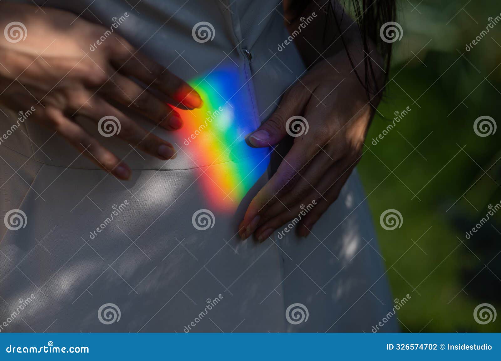Faceless Woman Catching Rainbow Ray with Her Hands Outdoors. Stock ...