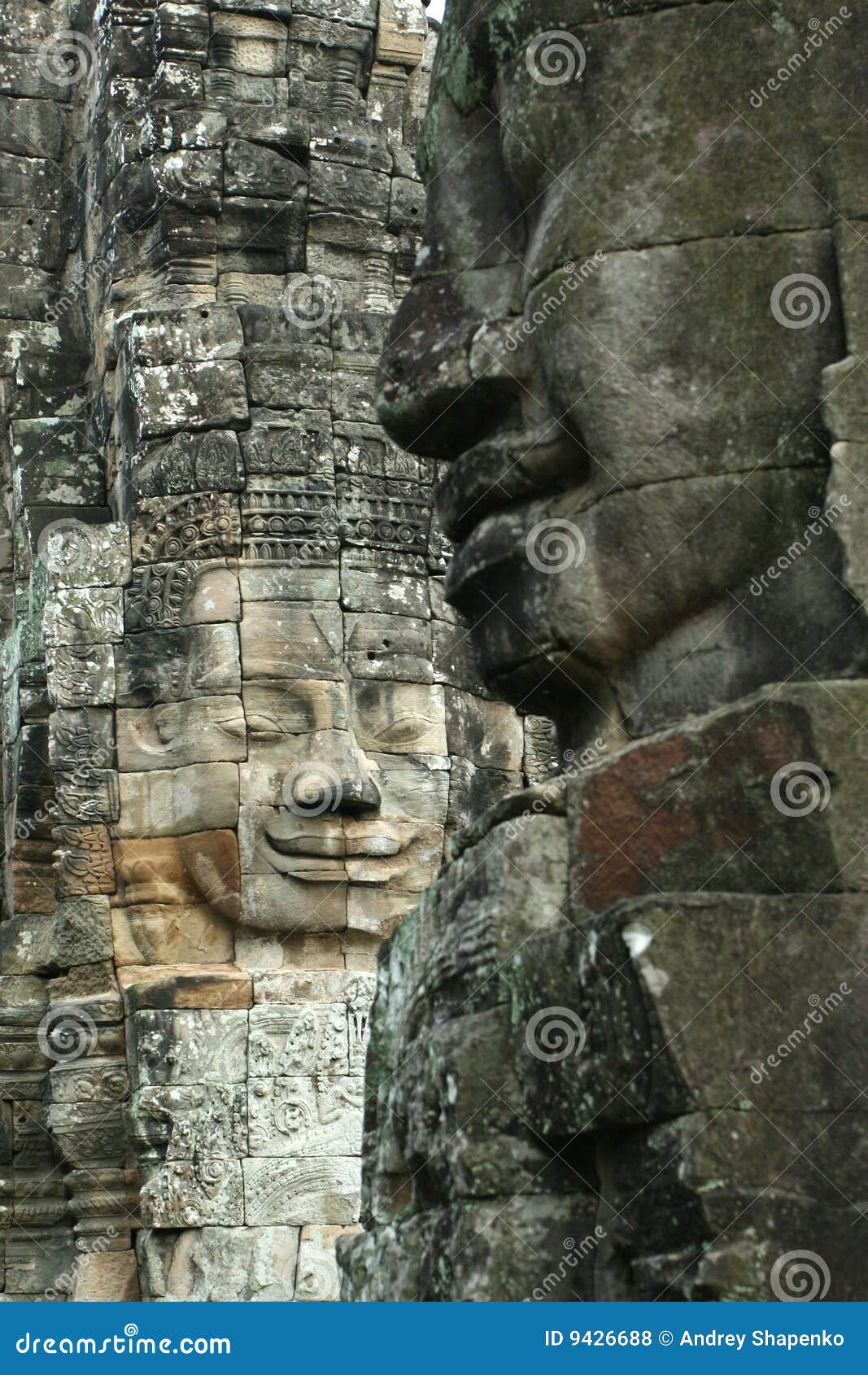 Faces of Angkor stock photo. Image of buddha, monument - 9426688
