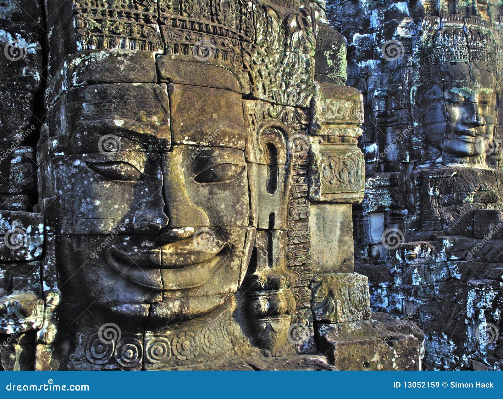 Faces at angkor wat. stock image. Image of ancient, bodhisattva - 13052159