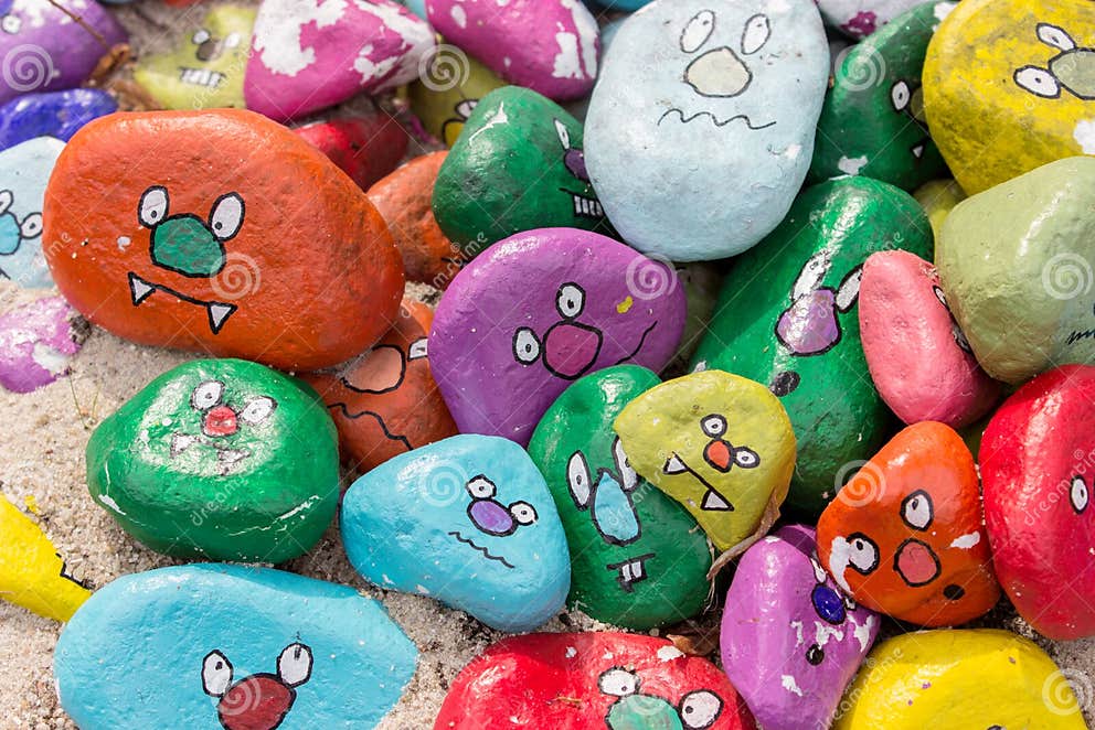 Faces stock photo. Image of pebbles, gravel, expressions - 57814356