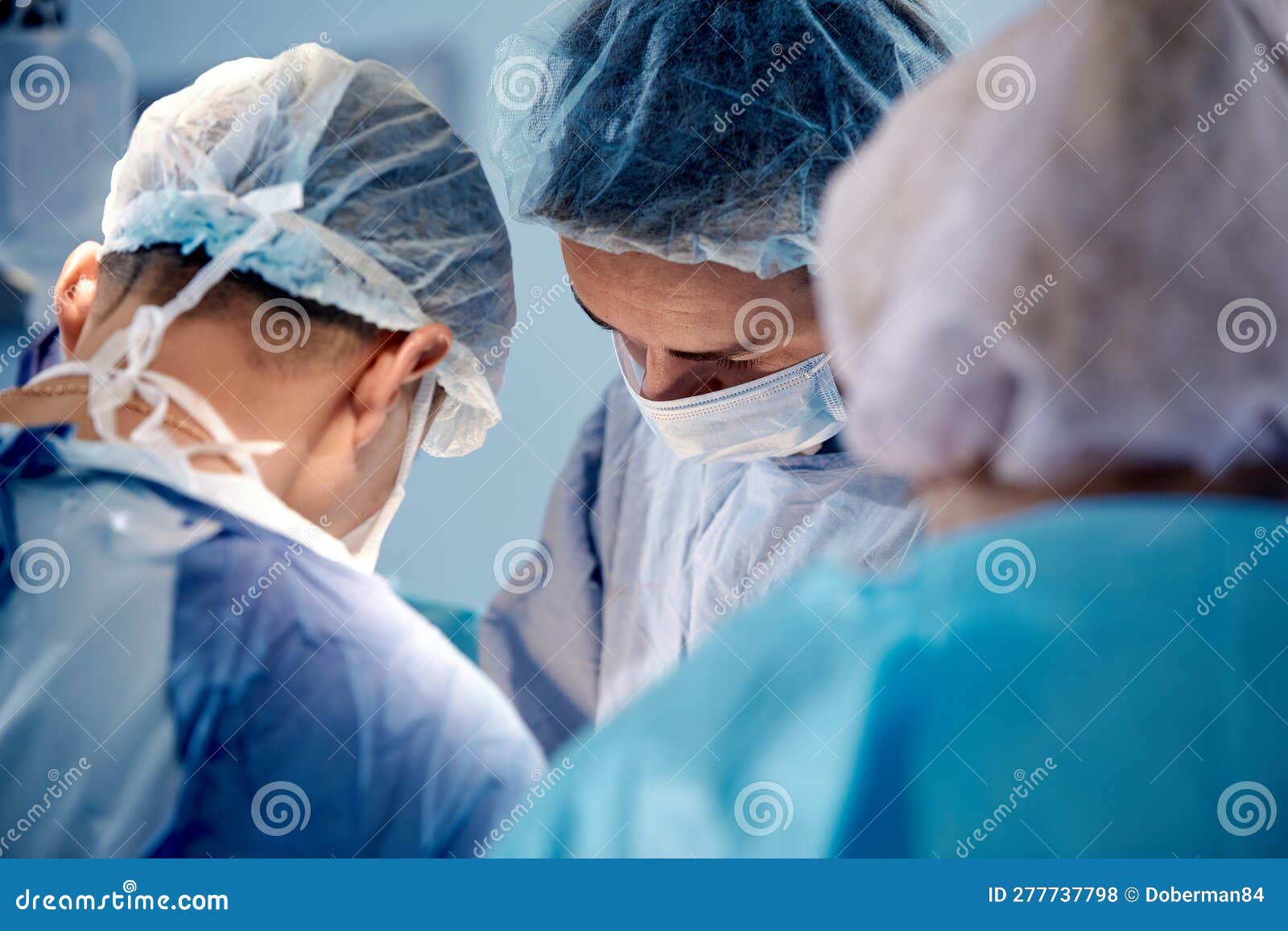 Faces of Surgeons Close-up during a Complex and Intense Operation ...