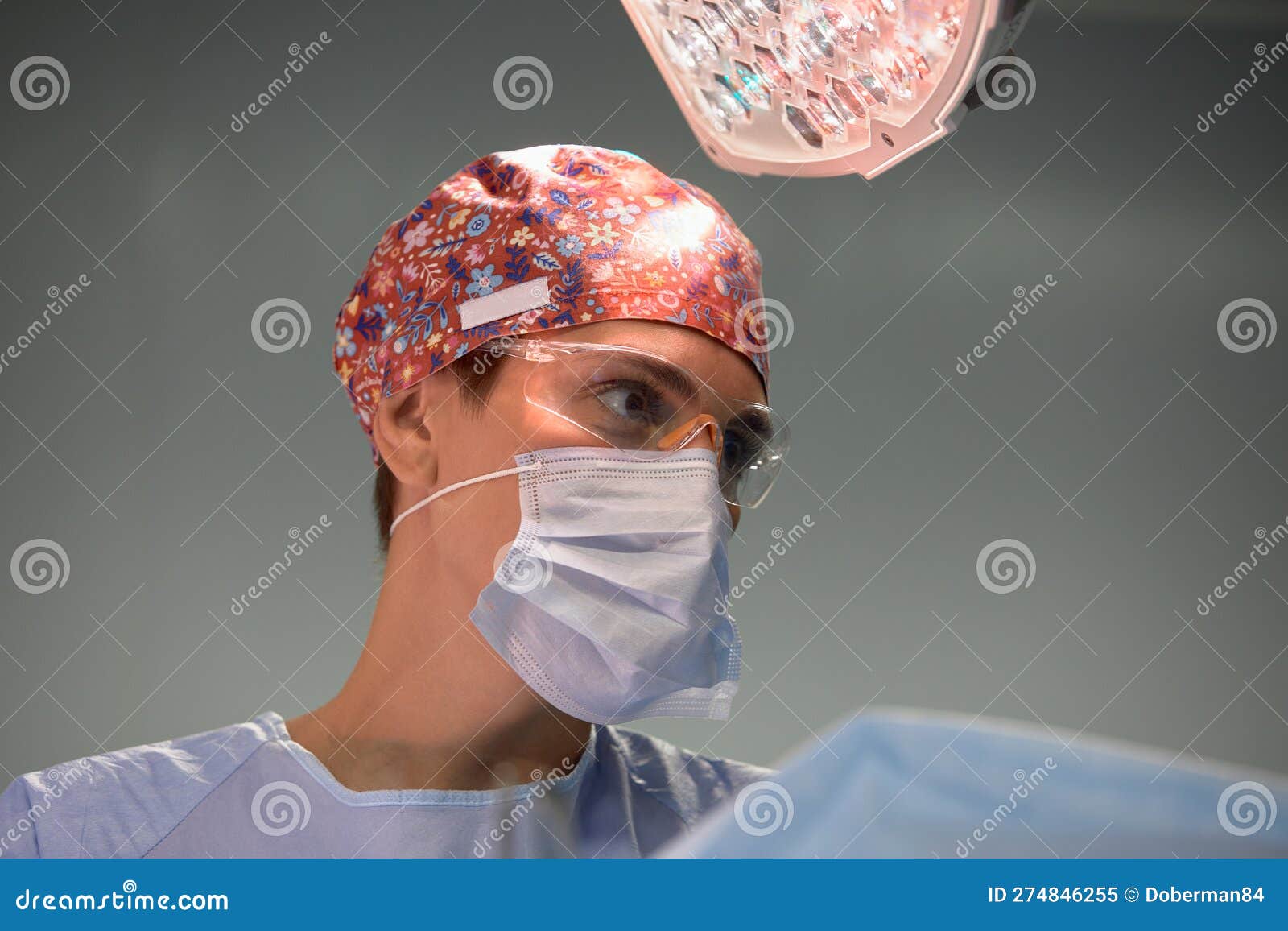 Faces of Surgeons in the Operating Room during the Operation. Modern ...
