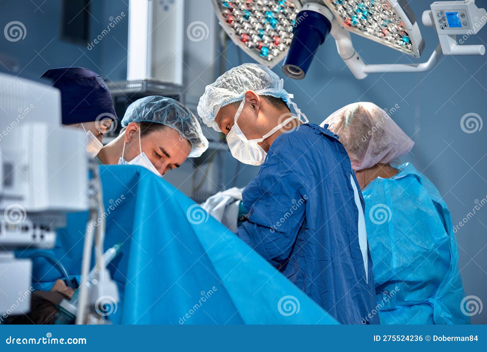 Faces of Surgeons in the Operating Room during the Operation. Modern ...