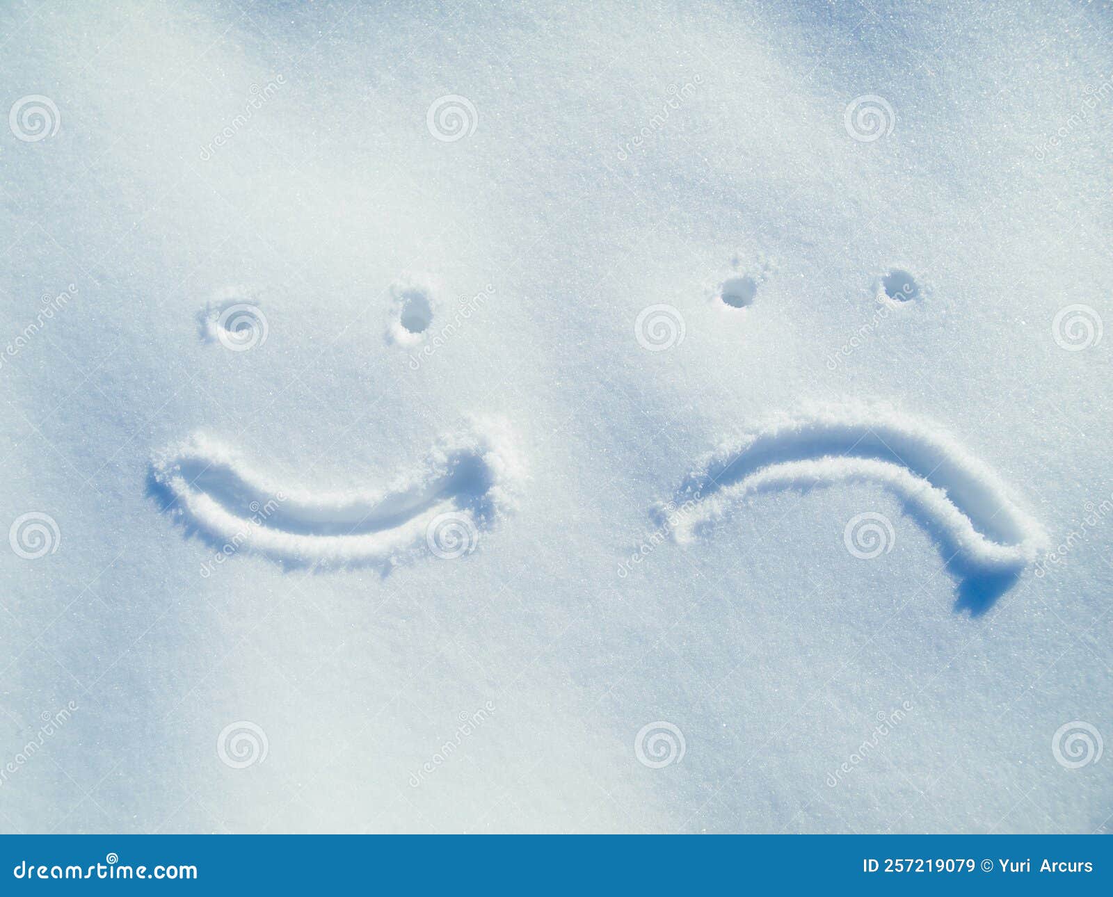 The Faces of Winter. Smiley and Frowny Faces in the Snow. Stock Image ...