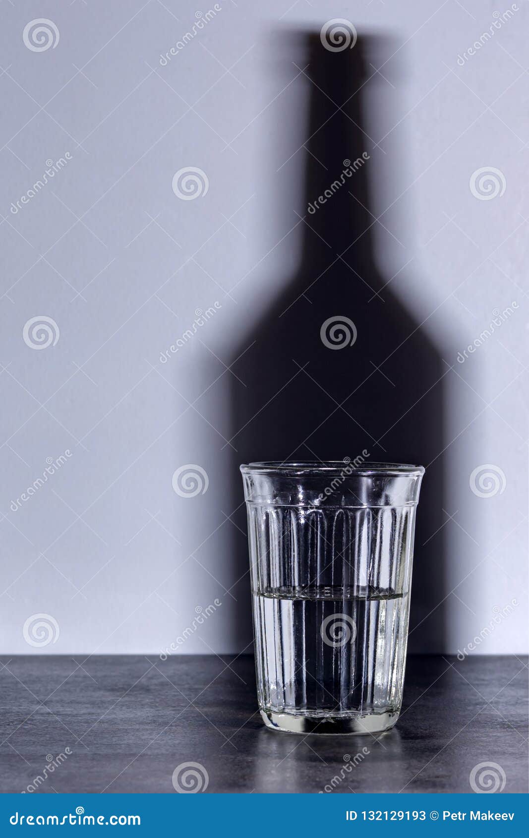Glass and the Shadow of a Bottle of Vodka Stock Image - Image of booze ...