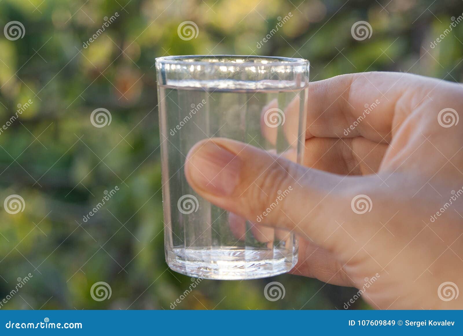 Faceted Glass of Vodka in His Hand. Stock Image - Image of russian ...