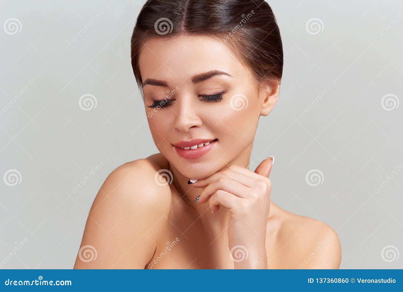 Facial Care Female Applying Cream And Smiling Beauty Face Portrait