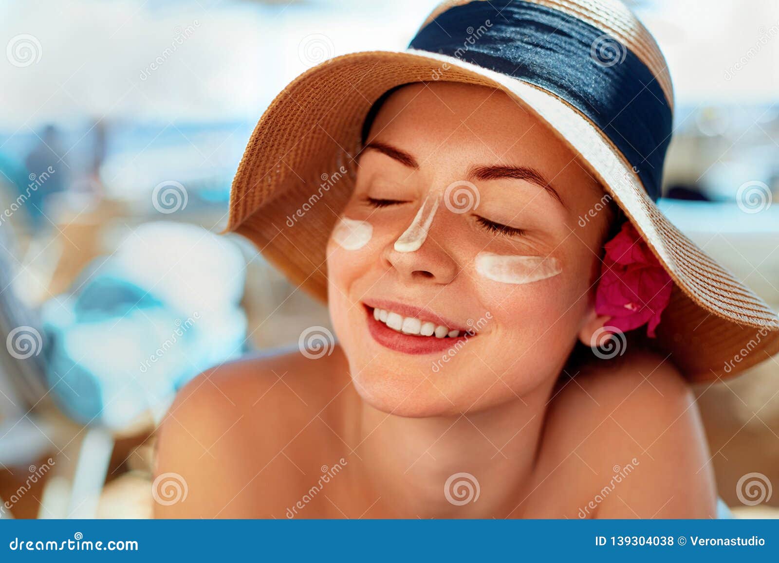 Facial Care Female Applying Sun Cream And Smiling Beauty Face Stock