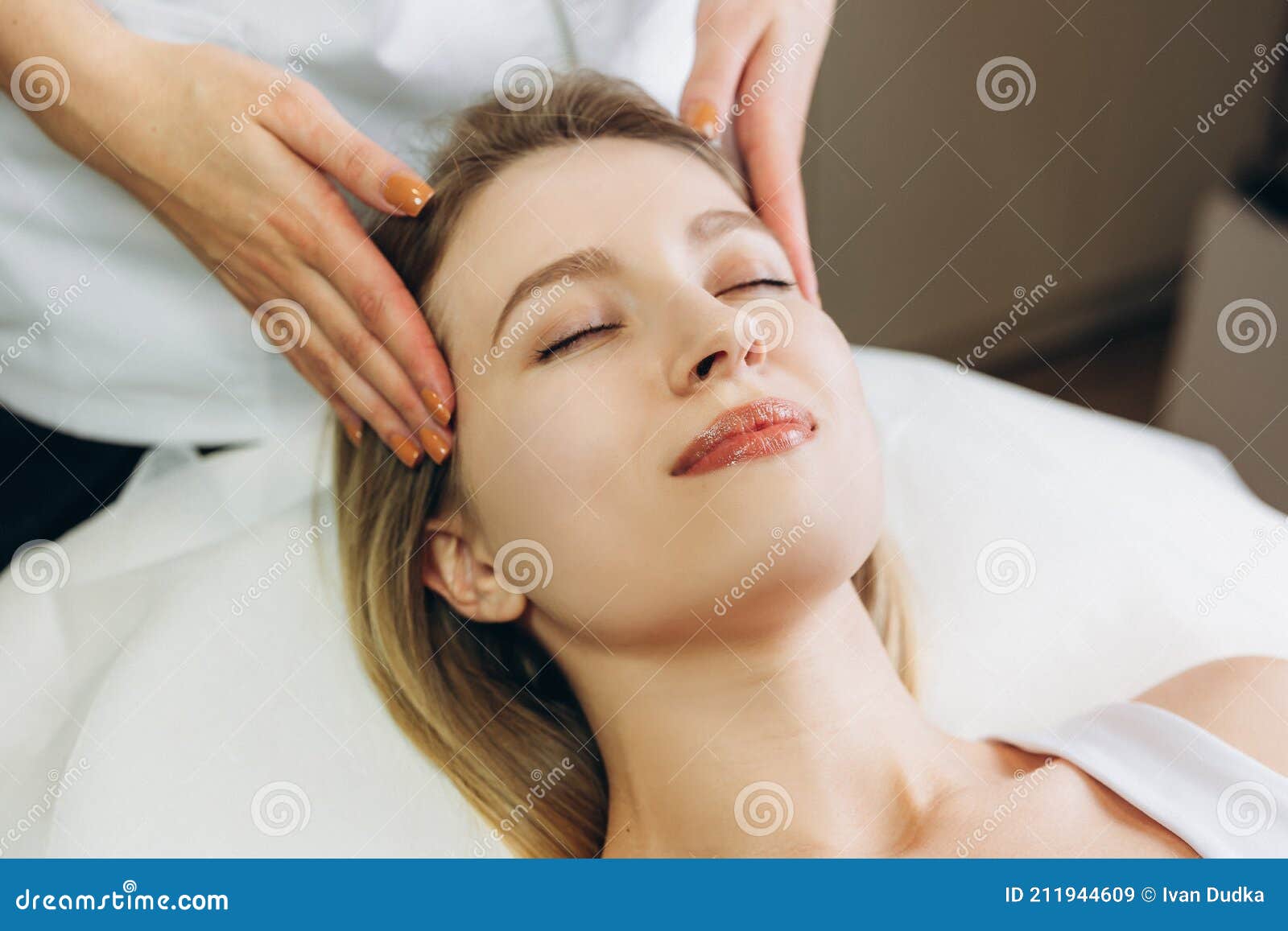 Facial Massage Beauty Treatment Close Up Of A Young Woman S Face Lying