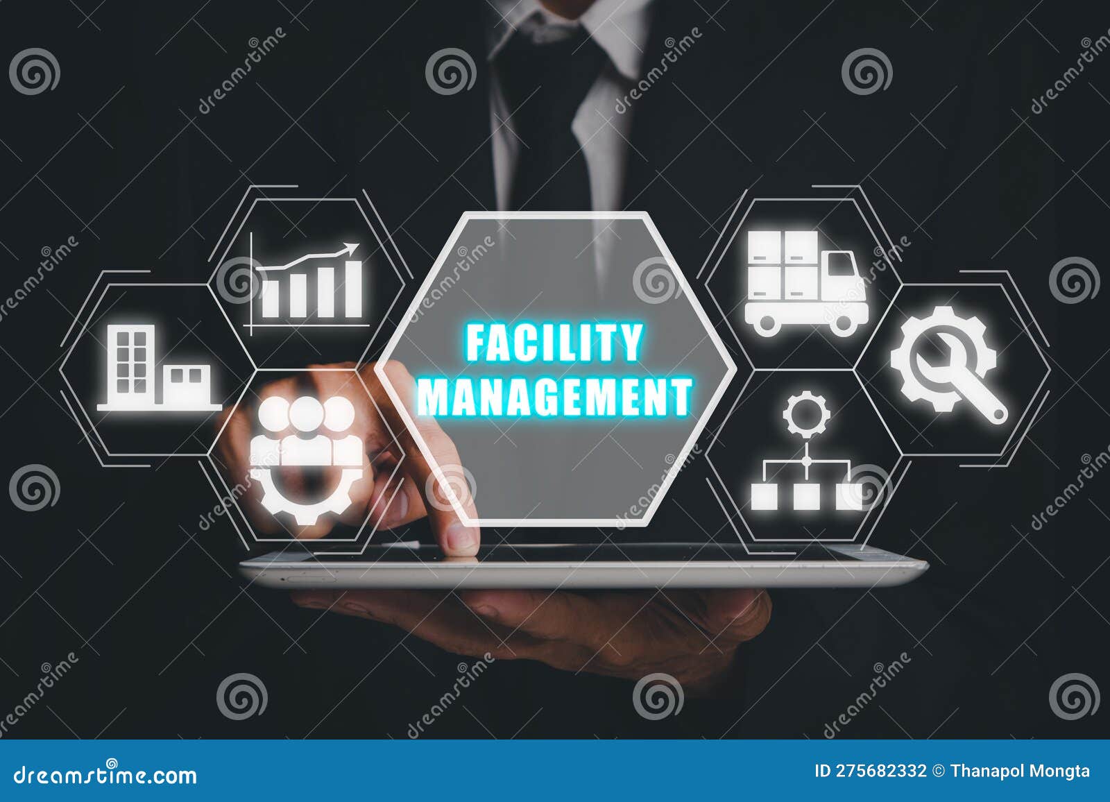 Businessman Using Tablet with Facility Management Icon on Virtual ...