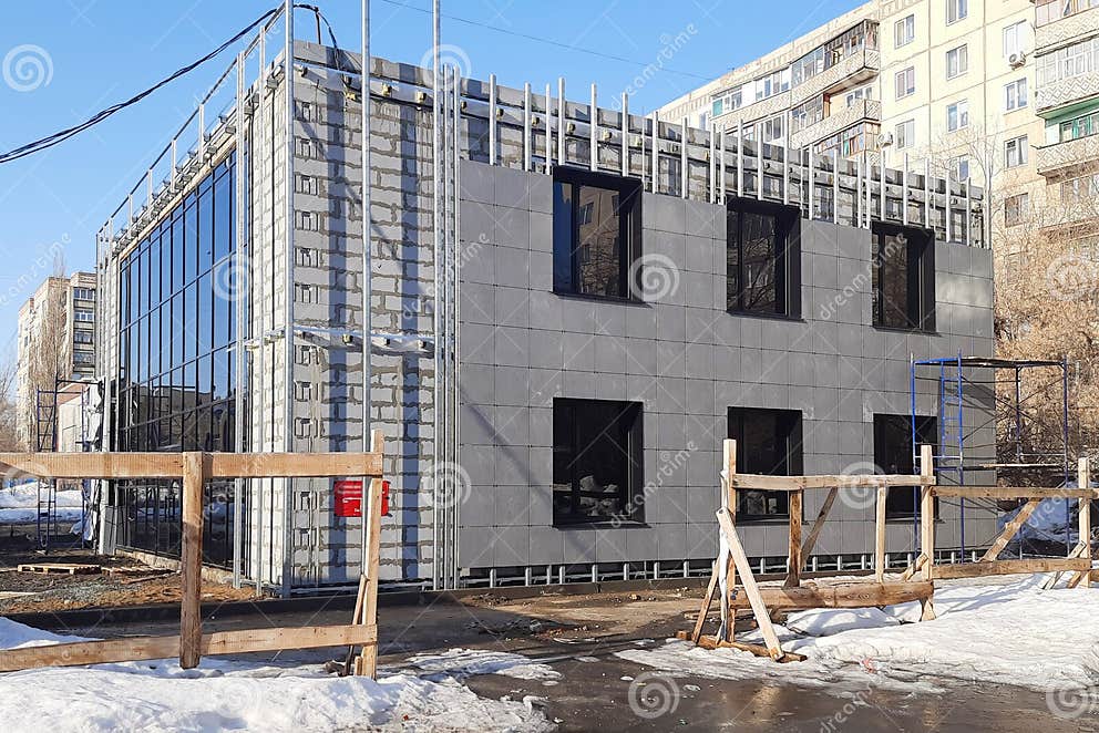 Facing a Building Under Construction with Square Panels Stock Image ...
