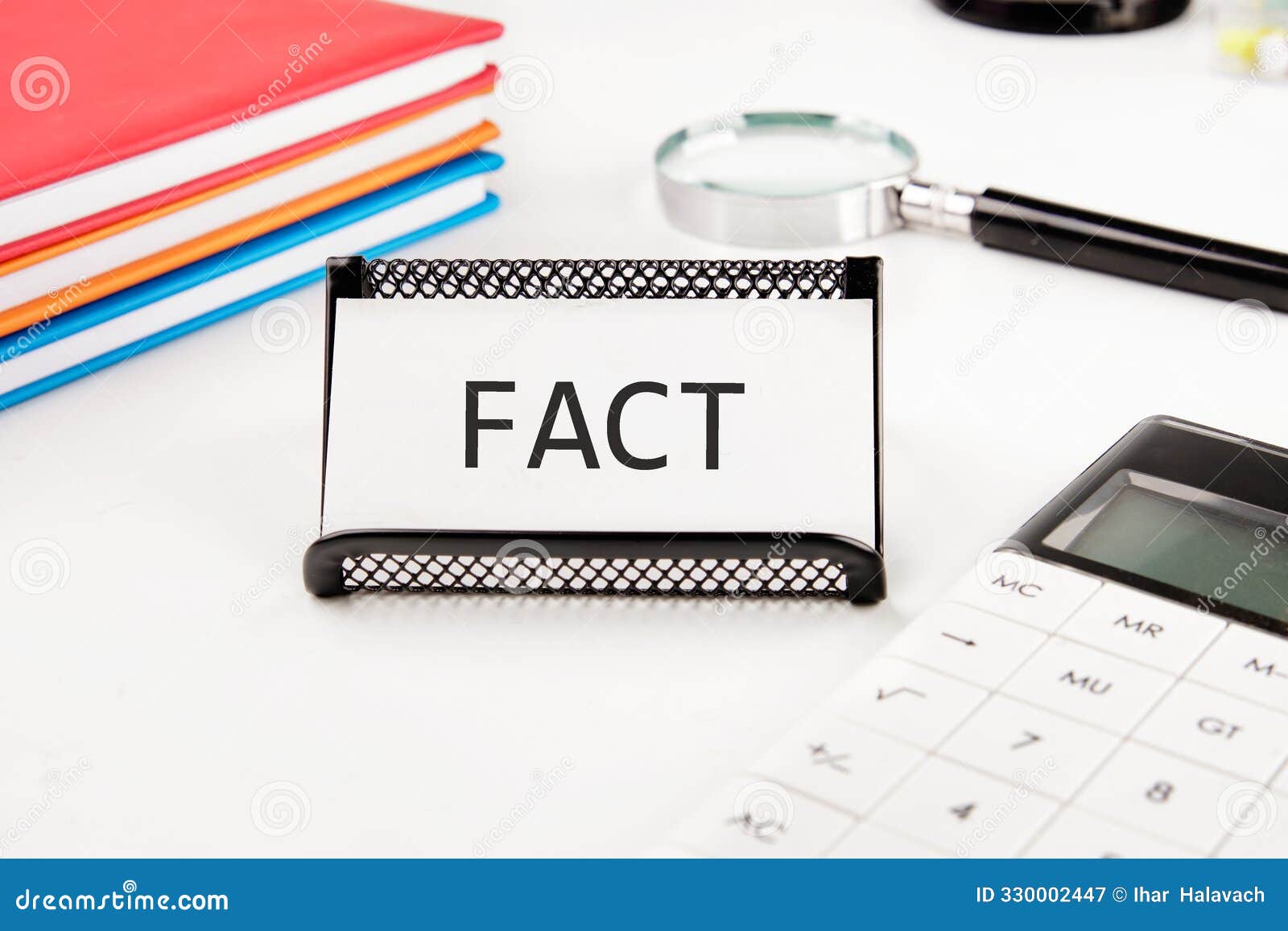 FACT CONCEPT. FACT on a Business Card in a Stand on a White Background ...