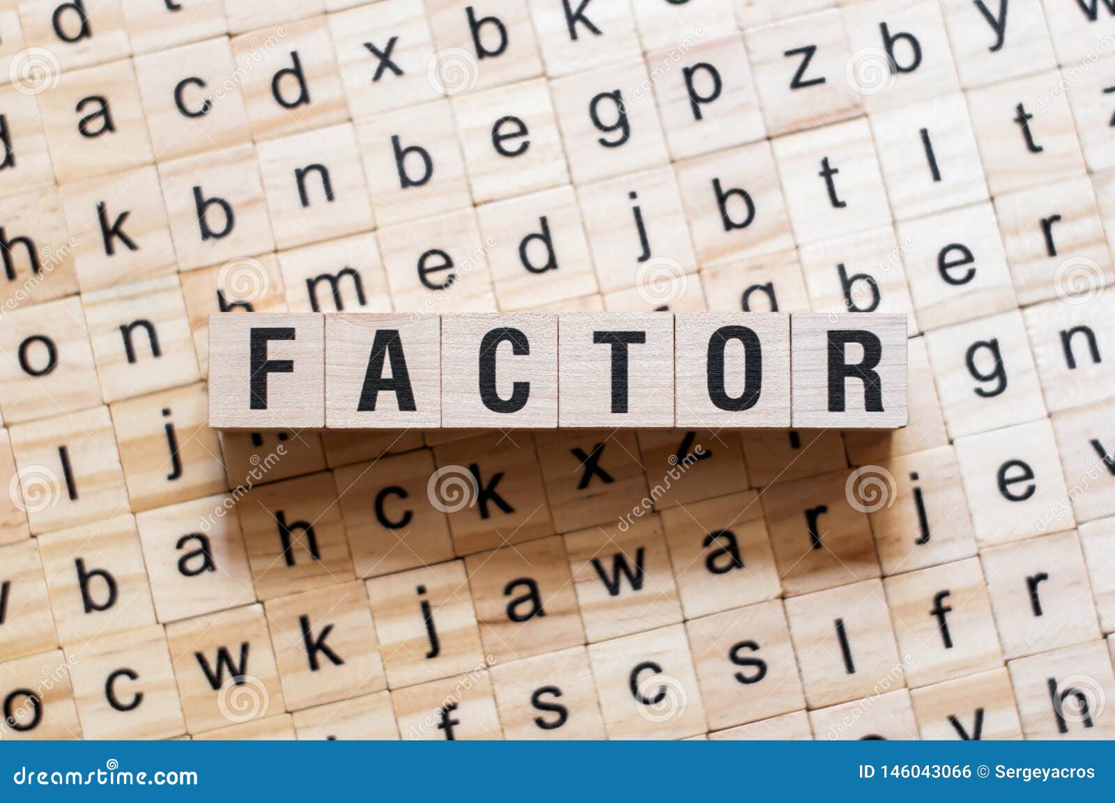 FACTOR The Word Is Written On A Yellow Piece Of Paper On A White ...