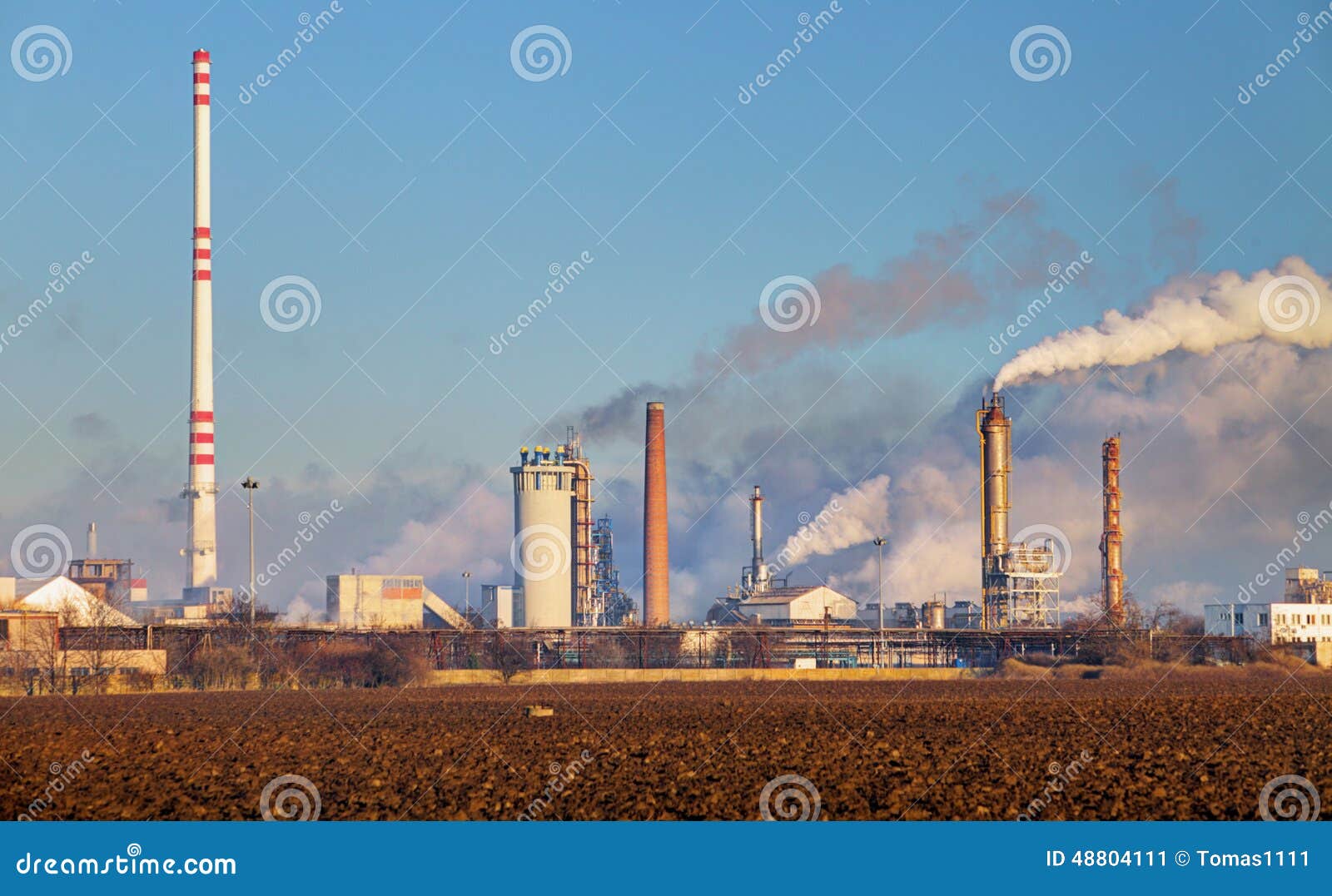 Factory with air pollution stock image. Image of plant - 48804111