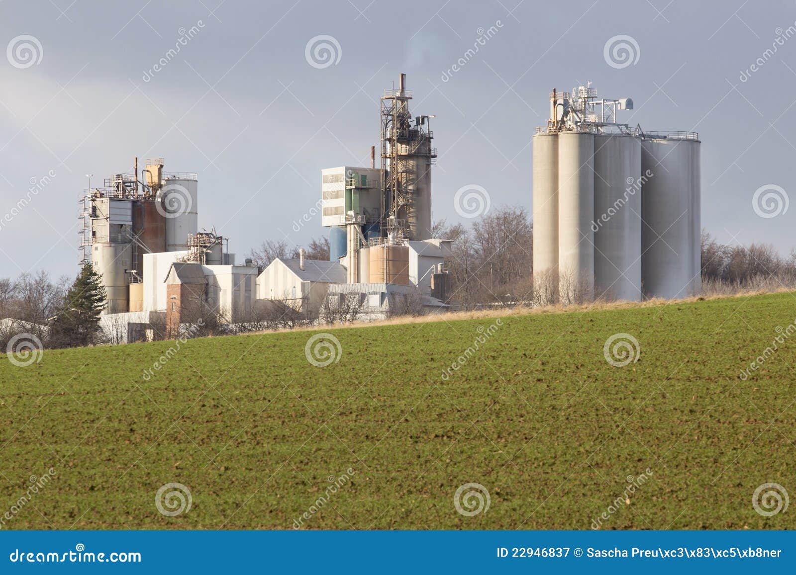 Factory behind field stock image. Image of business, detail - 22946837