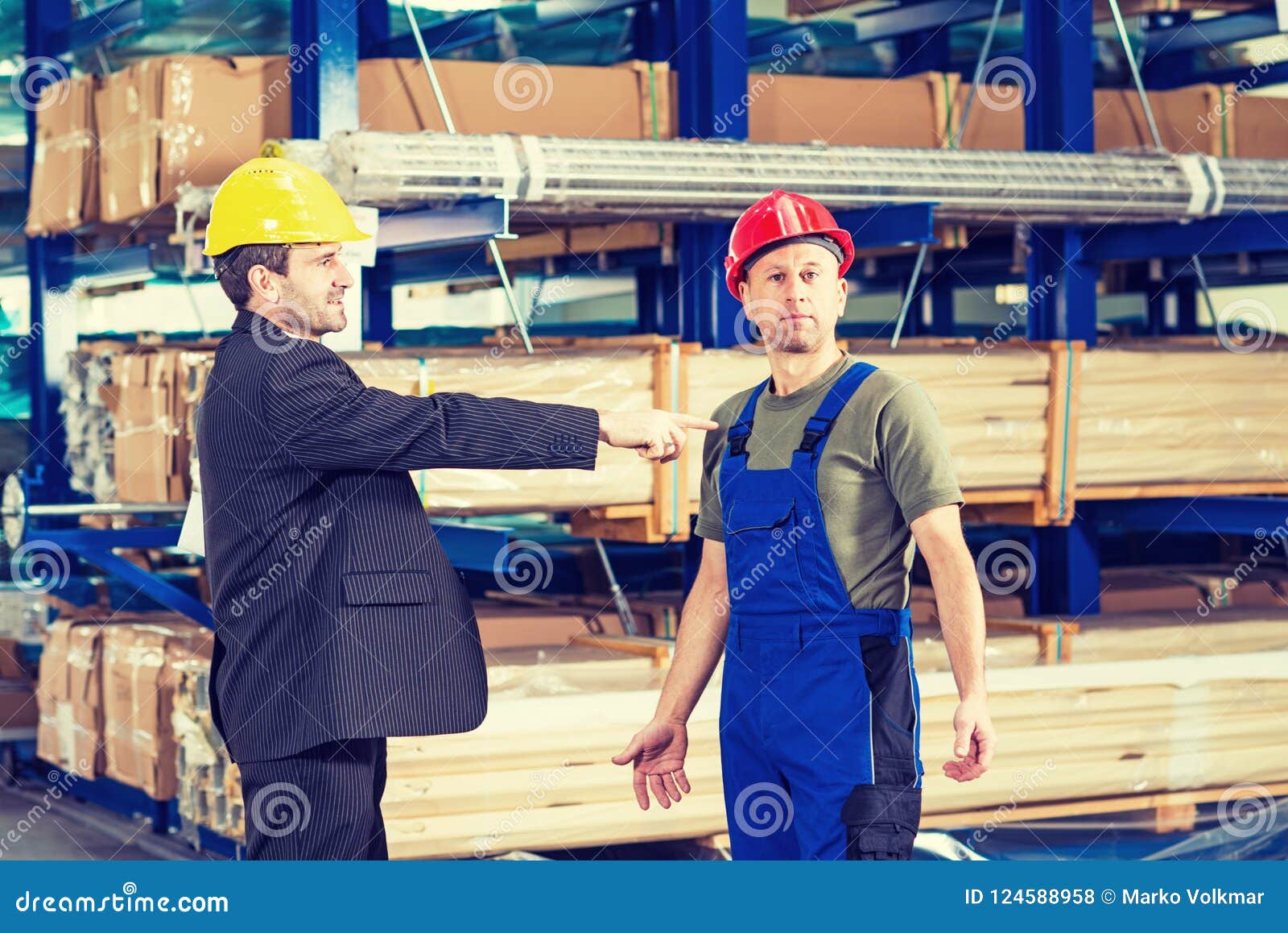 Boss Pointing at Worker in Factory Stock Photo - Image of point ...