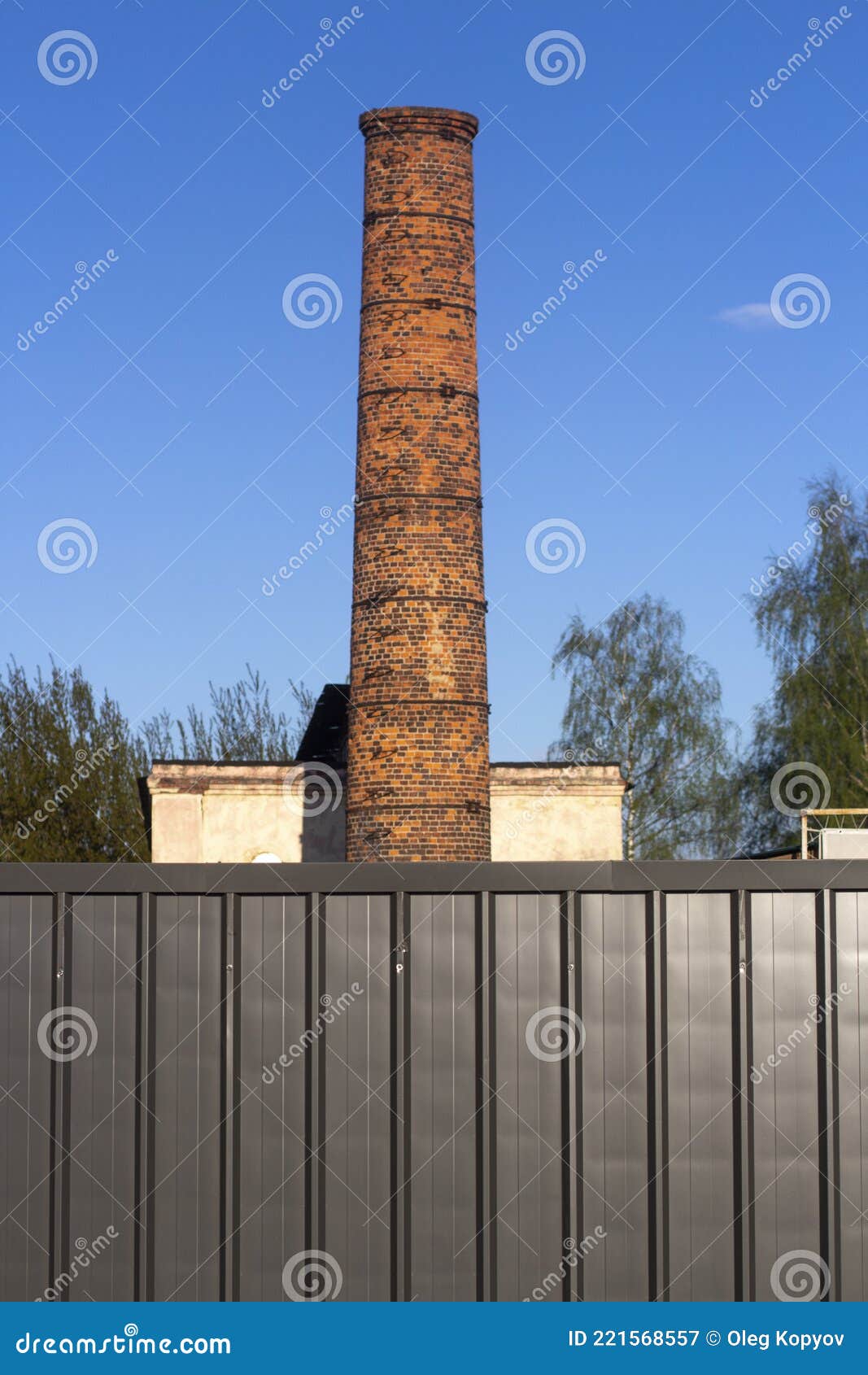 Factory Brick Pipe. a Brick Chimney Rises Against the Sky Stock Image ...