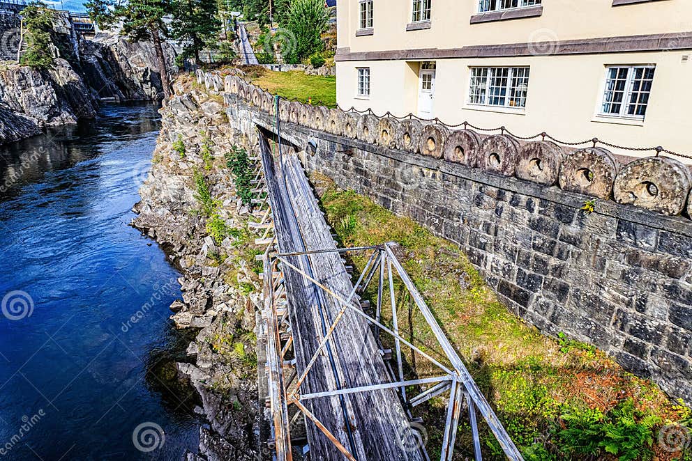 Factory Building at the Shore of a River Stock Photo - Image of ...