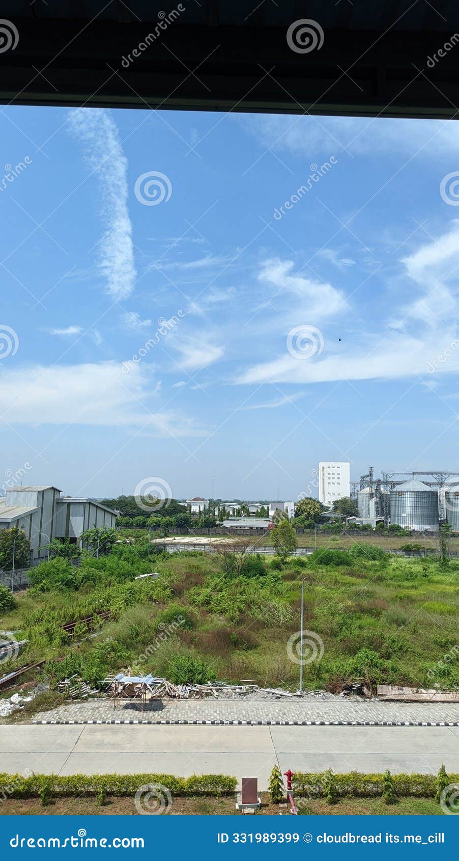 Factory Buildings that are Starting To Fill the Empty Land Stock Image ...