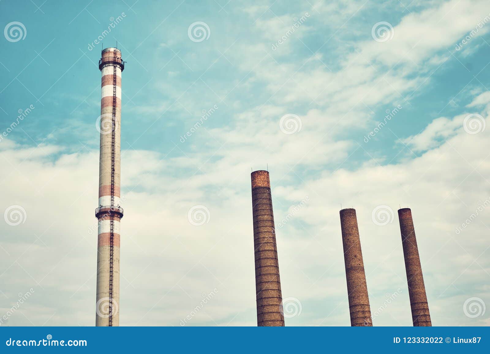 Factory chimneys stock photo. Image of brick, steam - 123332022