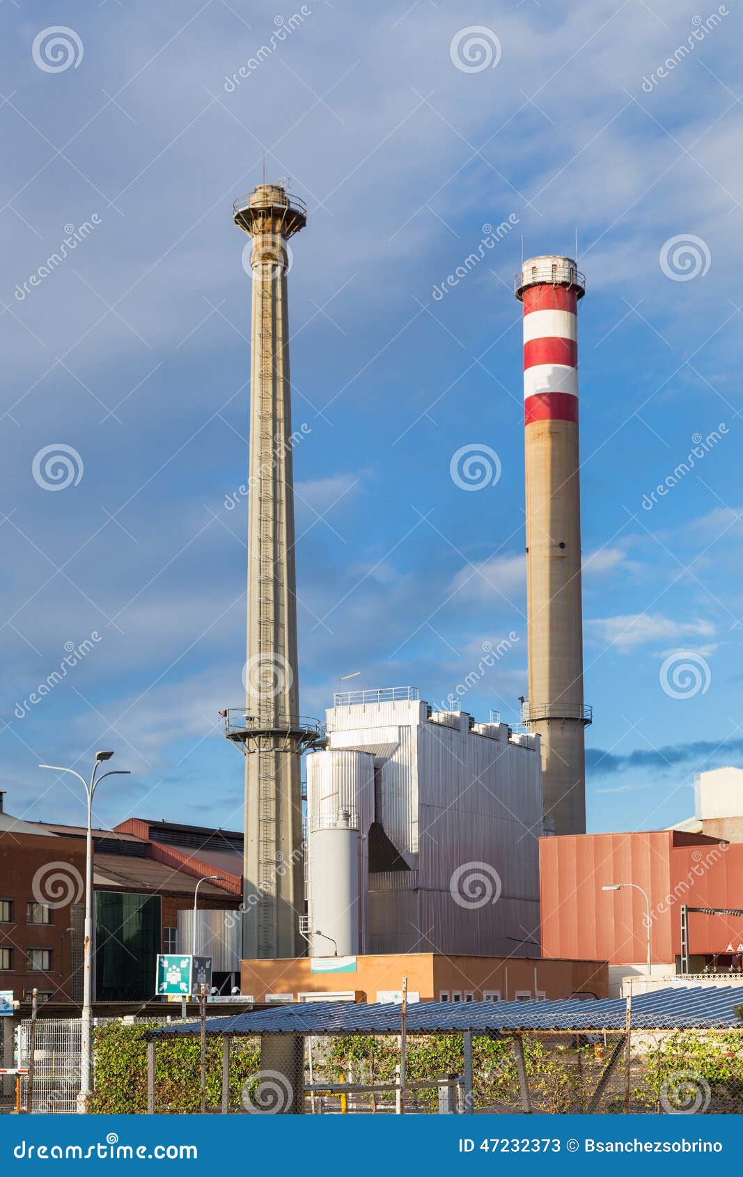 Factory chimneys stock image. Image of manufacturing - 47232373
