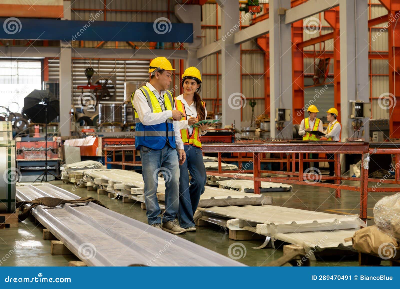 Factory Engineer with Assistant Using Inspect Factory. Pano ...
