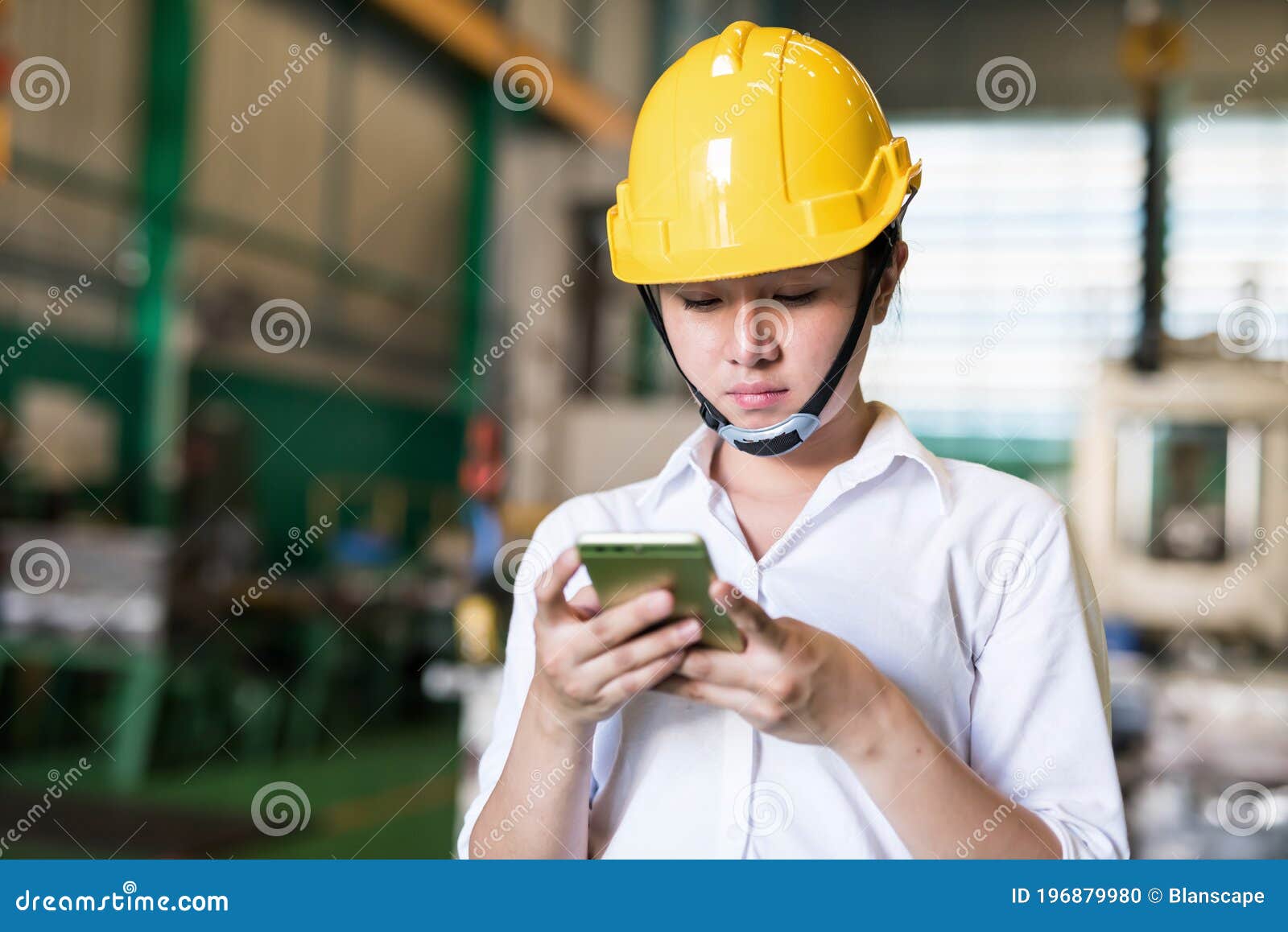 Factory Engineer Chat and Use App on Smartphone Stock Photo - Image of ...