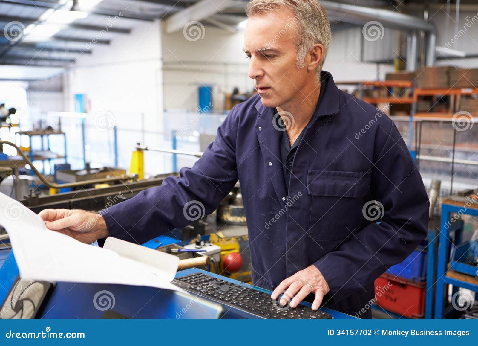 Factory Engineer Operating Hydraulic Tube Bender Stock Photo - Image of ...