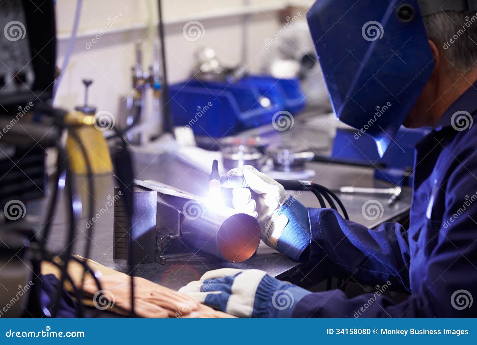 Factory Engineer Operating TIG Welding Machine Stock Photo - Image of ...