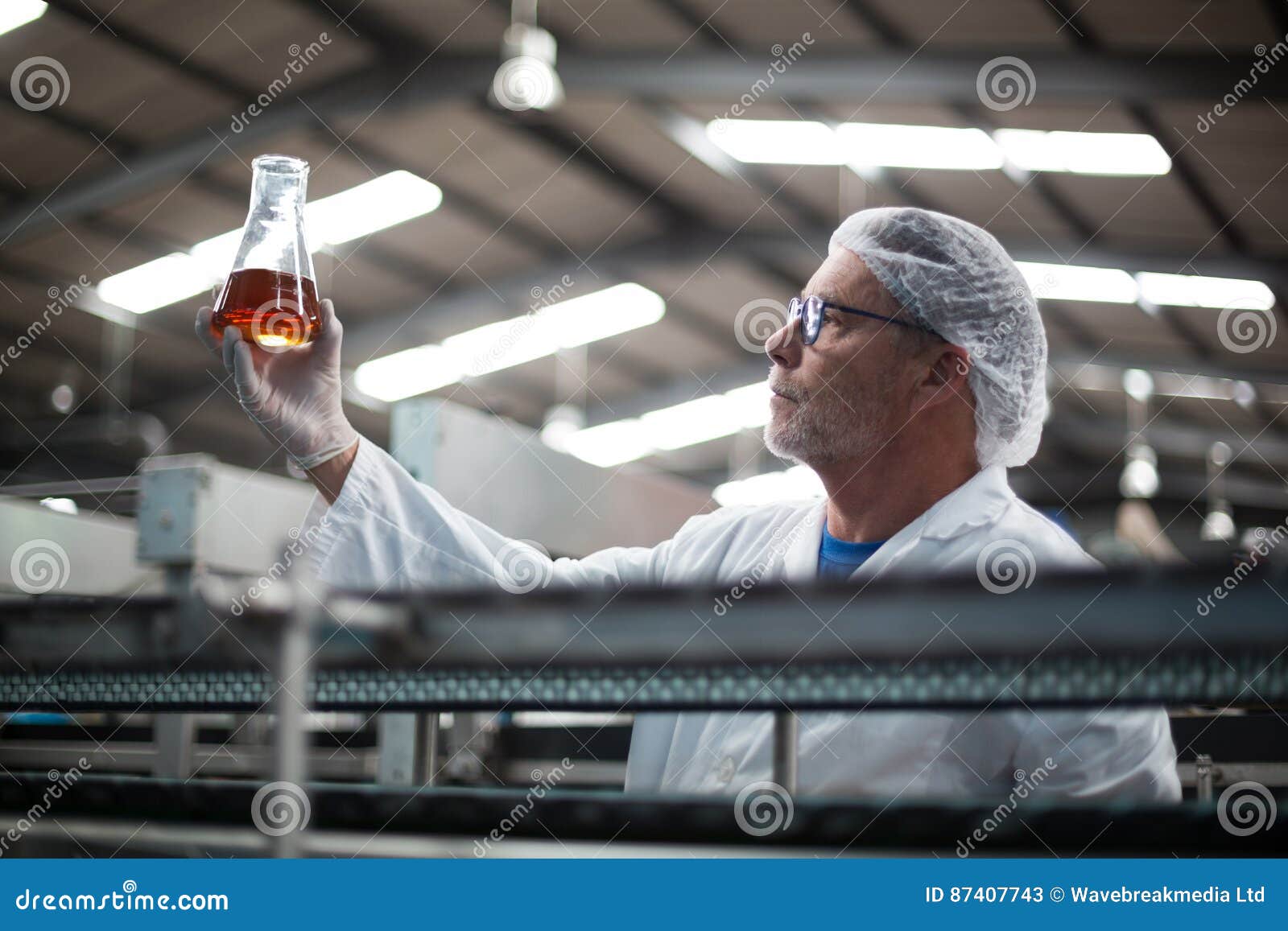 Factory Engineers Checking a Sample of Drink Stock Image - Image of ...