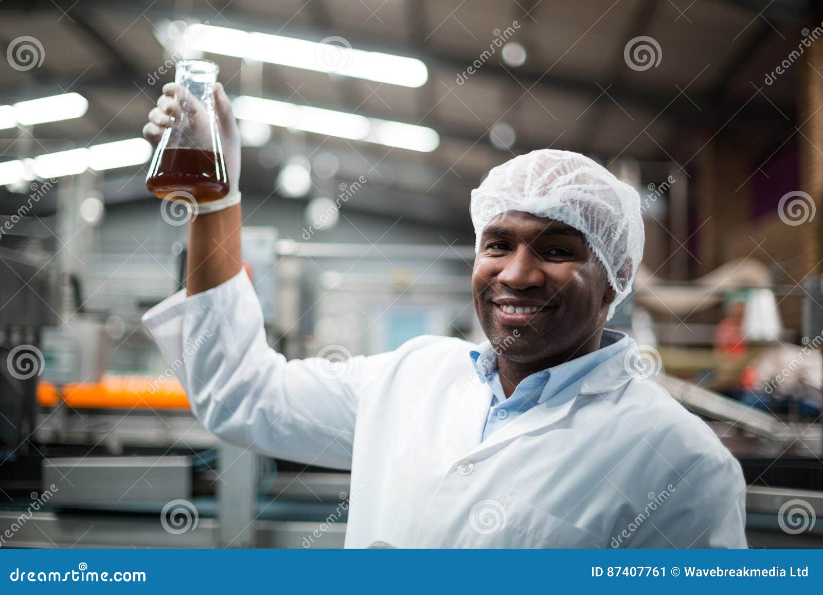 Factory Engineers Holding a Sample of Drink Stock Image - Image of ...