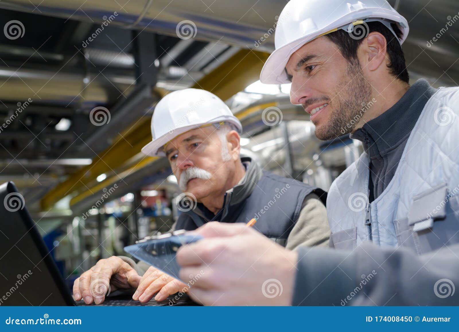 Factory Engineers Looking at Laptop Stock Photo - Image of expertise ...
