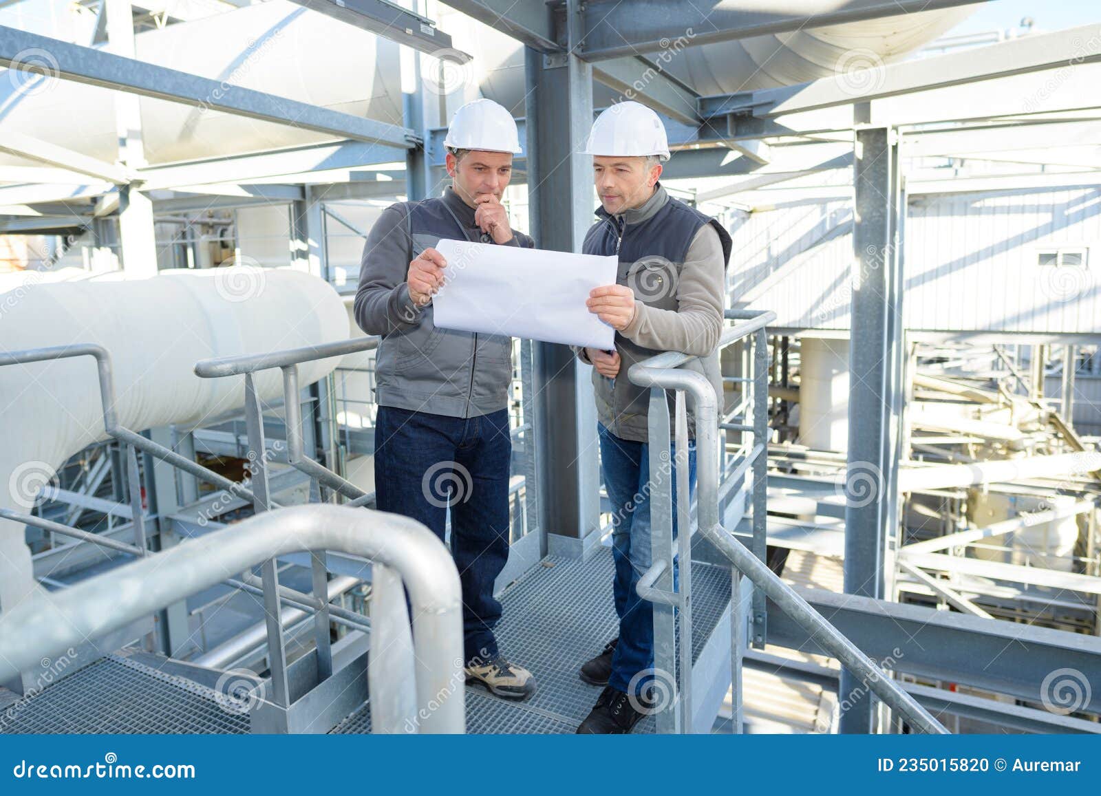 Factory Engineers Studying Plan Stock Photo - Image of studying ...