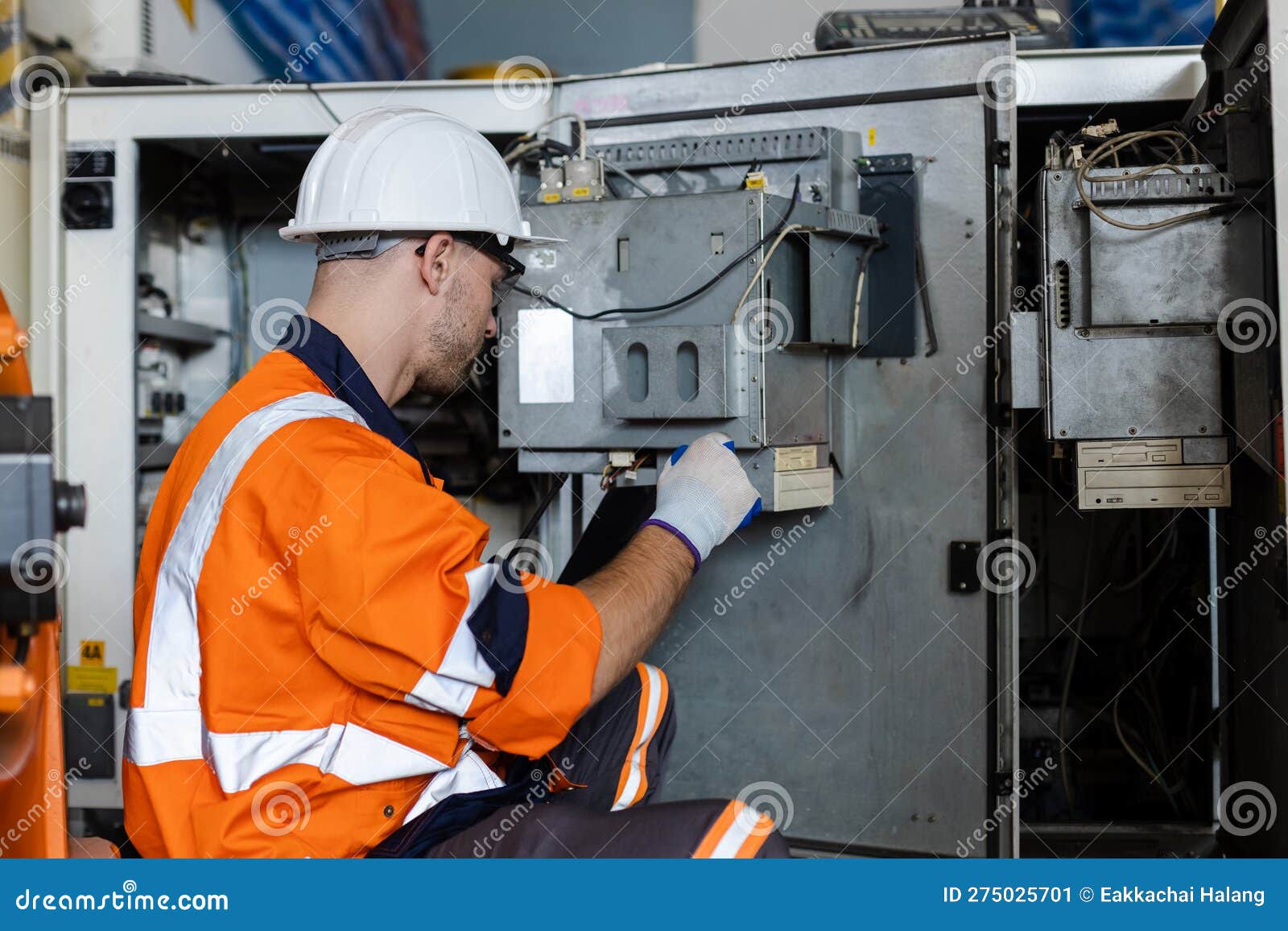 Factory Engineers Wear Uniform and Helmet are Checking Quality System ...