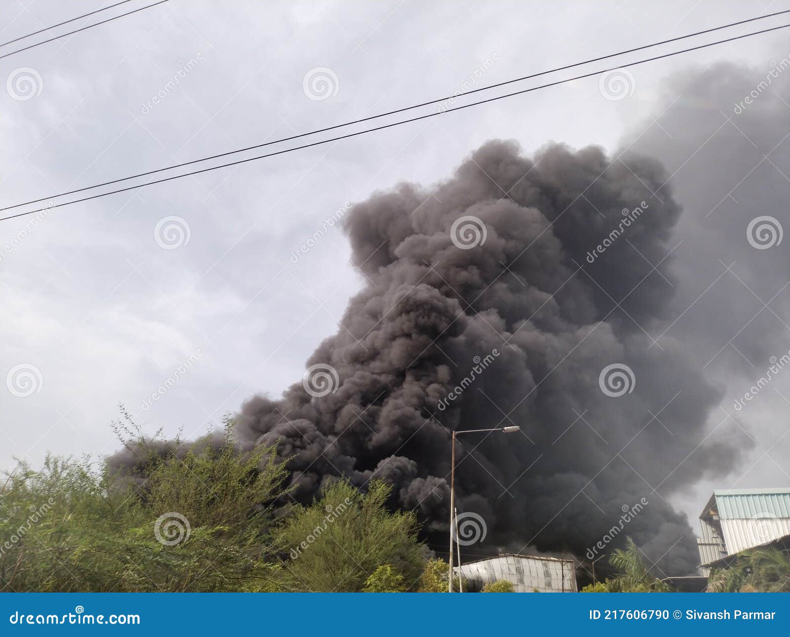 Factory fire india stock photo. Image of person, factory - 217606790