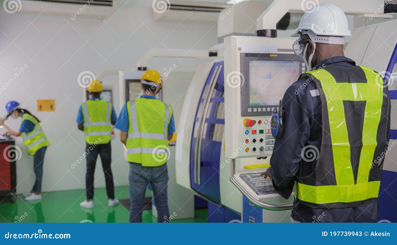Factory Foreman and Workers Working with Cnc Machine Control Panel ...