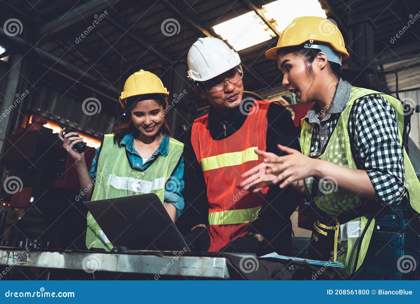 Factory Job Workers Working and Discussing Manufacturing Plan in the ...