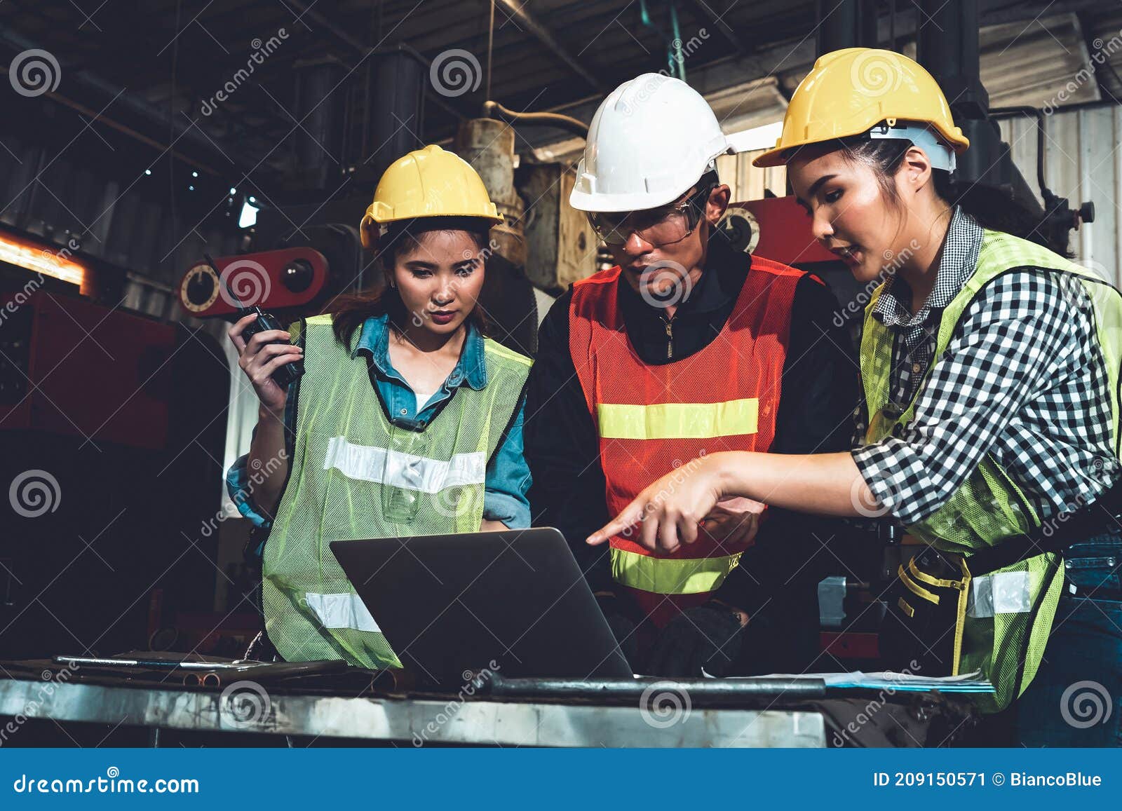 Factory Job Workers Working and Discussing Manufacturing Plan in the ...